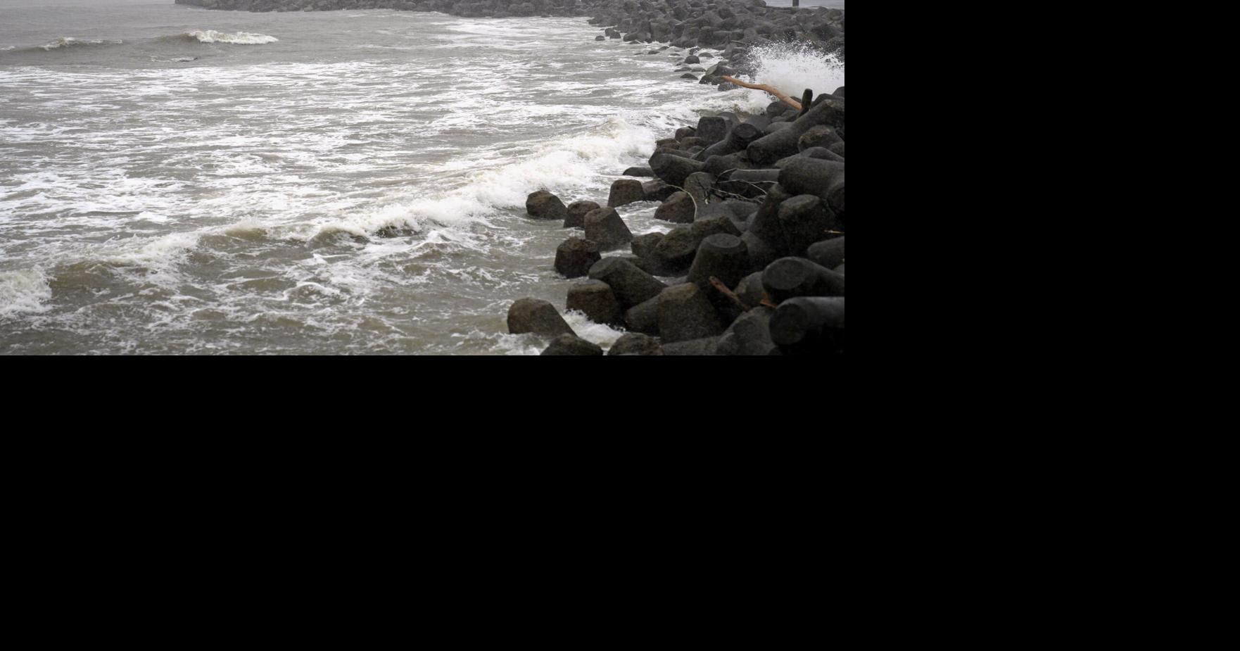 2 tropical storms pound Japan with floods and landslides, killing 1 ...
