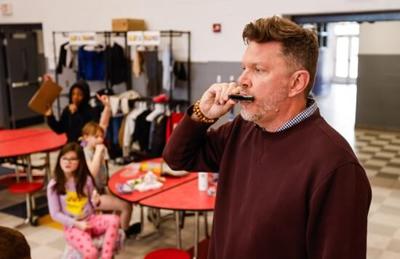 A winning tune: Middletown principal uses harmonica to quiet students ...