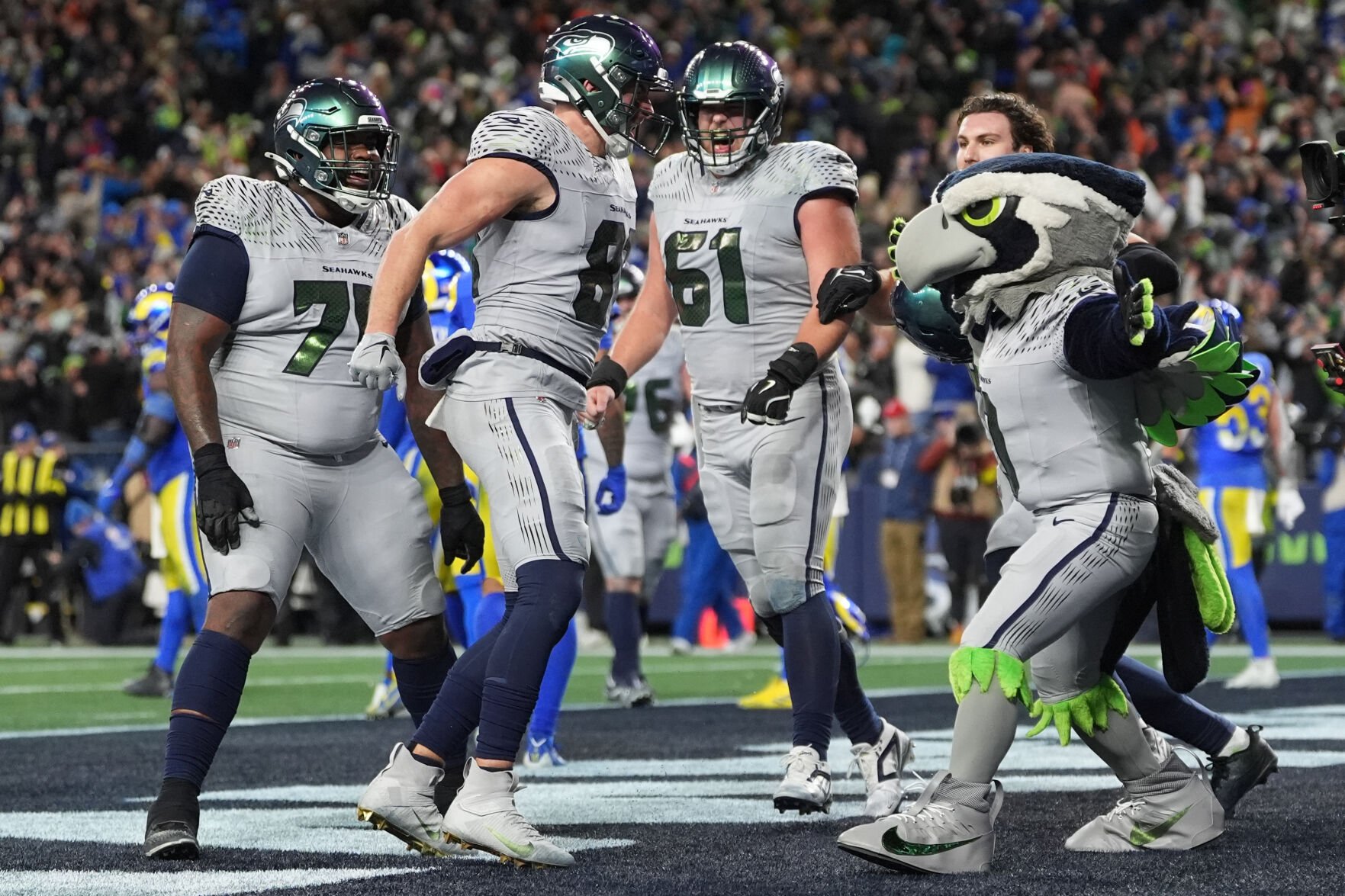Seahawks rally from 16-point deficit and stun Rams in OT to move atop ...