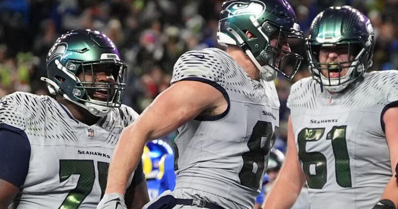Seahawks rally from 16-point deficit and stun Rams in OT to move atop ...