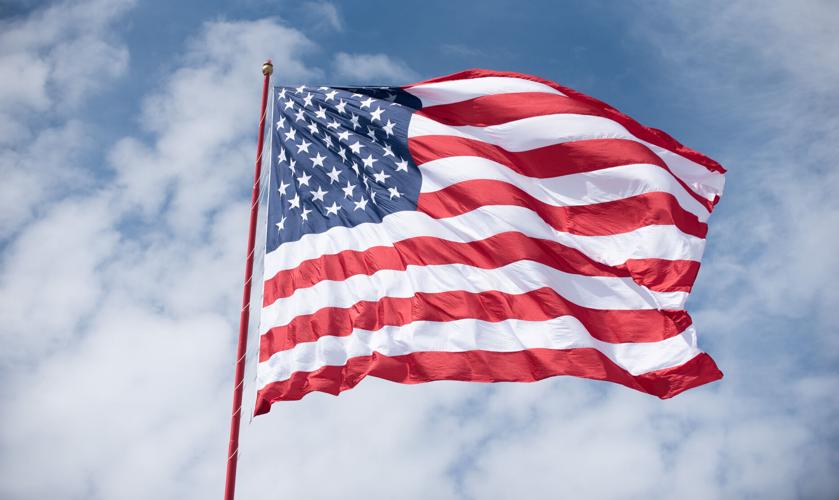 Fort Wayne dealership raises flag on pole replacing one that broke in ...