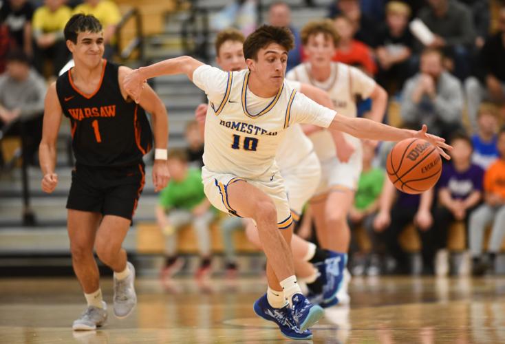 Friday Gallery: Warsaw defeats Homestead in overtime | Multimedia ...