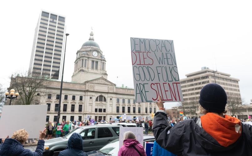 Scenes from a Day of Action Rally and Food Drive | Local ...