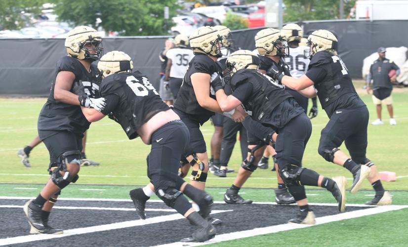 Purdue's new-look offensive line works on building chemistry ...