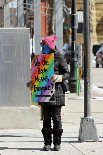 Nearly 100 people protest federal actions at Allen County Courthouse ...