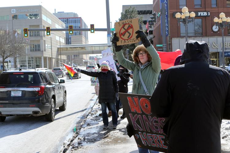 Nearly 100 people protest federal actions at Allen County Courthouse ...