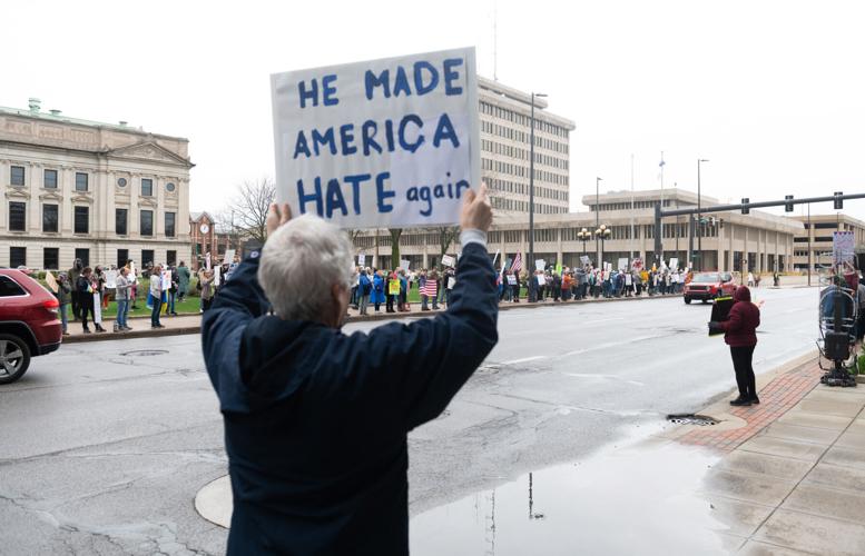Scenes from a Day of Action Rally and Food Drive | Local ...
