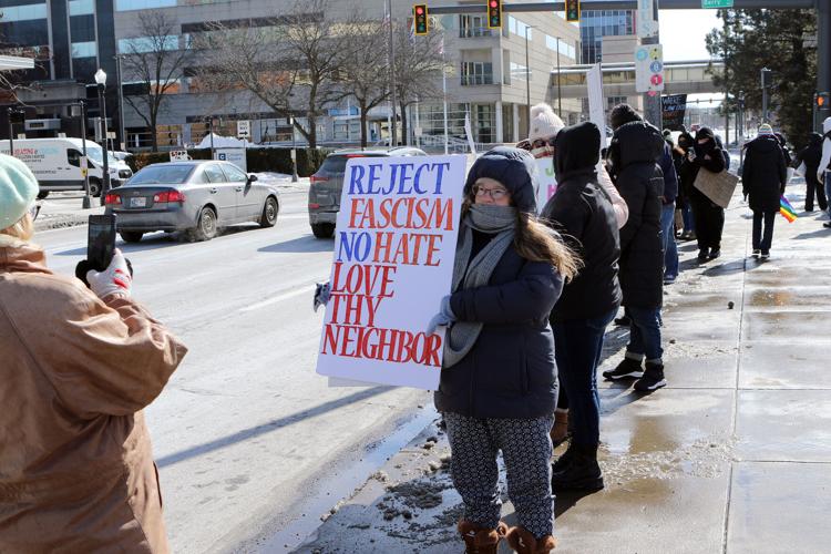 Nearly 100 people protest federal actions at Allen County Courthouse ...