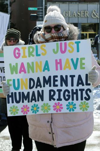 Nearly 100 people protest federal actions at Allen County Courthouse ...