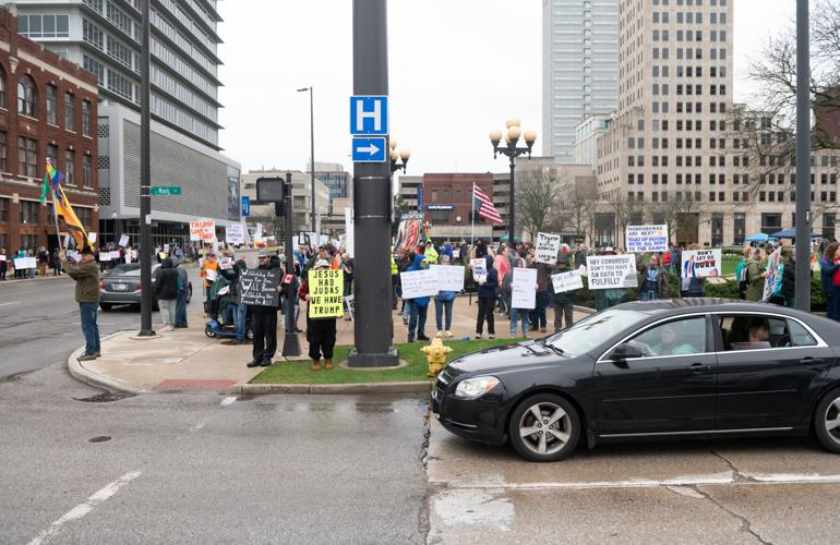 Scenes from a Day of Action Rally and Food Drive | Local ...