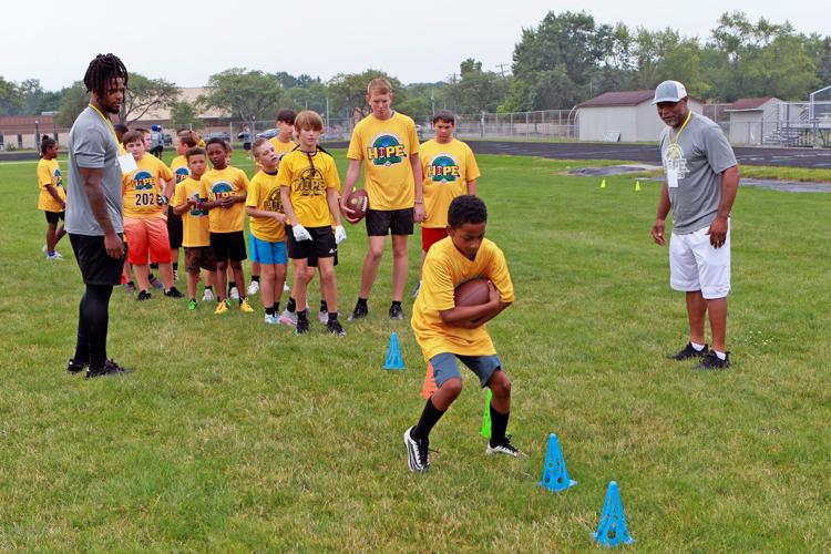 Rod Woodson's football camp opens with aim to teach kids football, life ...