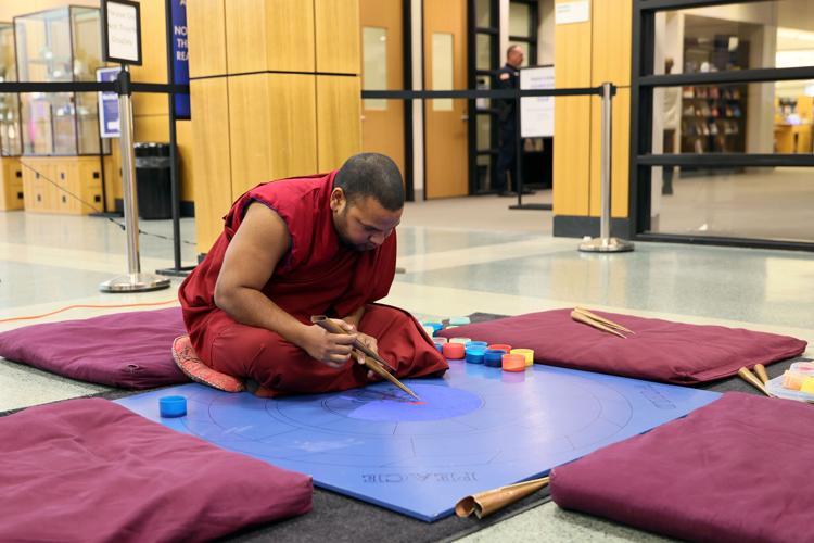 Monks start work on mandala at Allen County Public Library ...