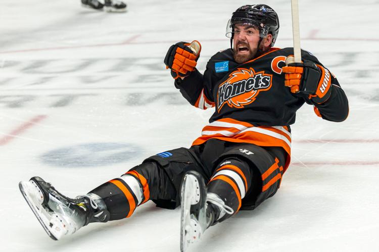 Dugan scores from center ice, Komets win Game 2 against Iowa | Sports ...