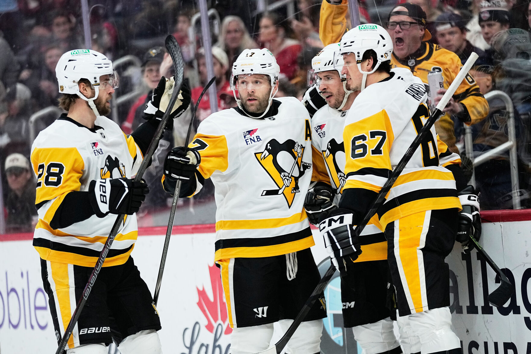 Bryan Rust and Yegor Chinakhov send the streaking Penguins past the Red ...