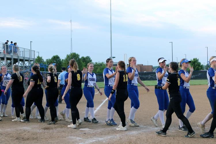 Carroll overcomes early deficit, blasts way to a 13-2 victory over ...