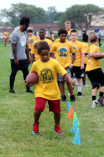 Rod Woodson's football camp opens with aim to teach kids football, life ...