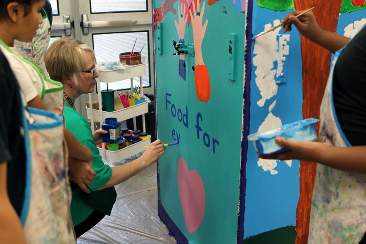 Fort Wayne students add art to outdoor food pantry | Schools ...