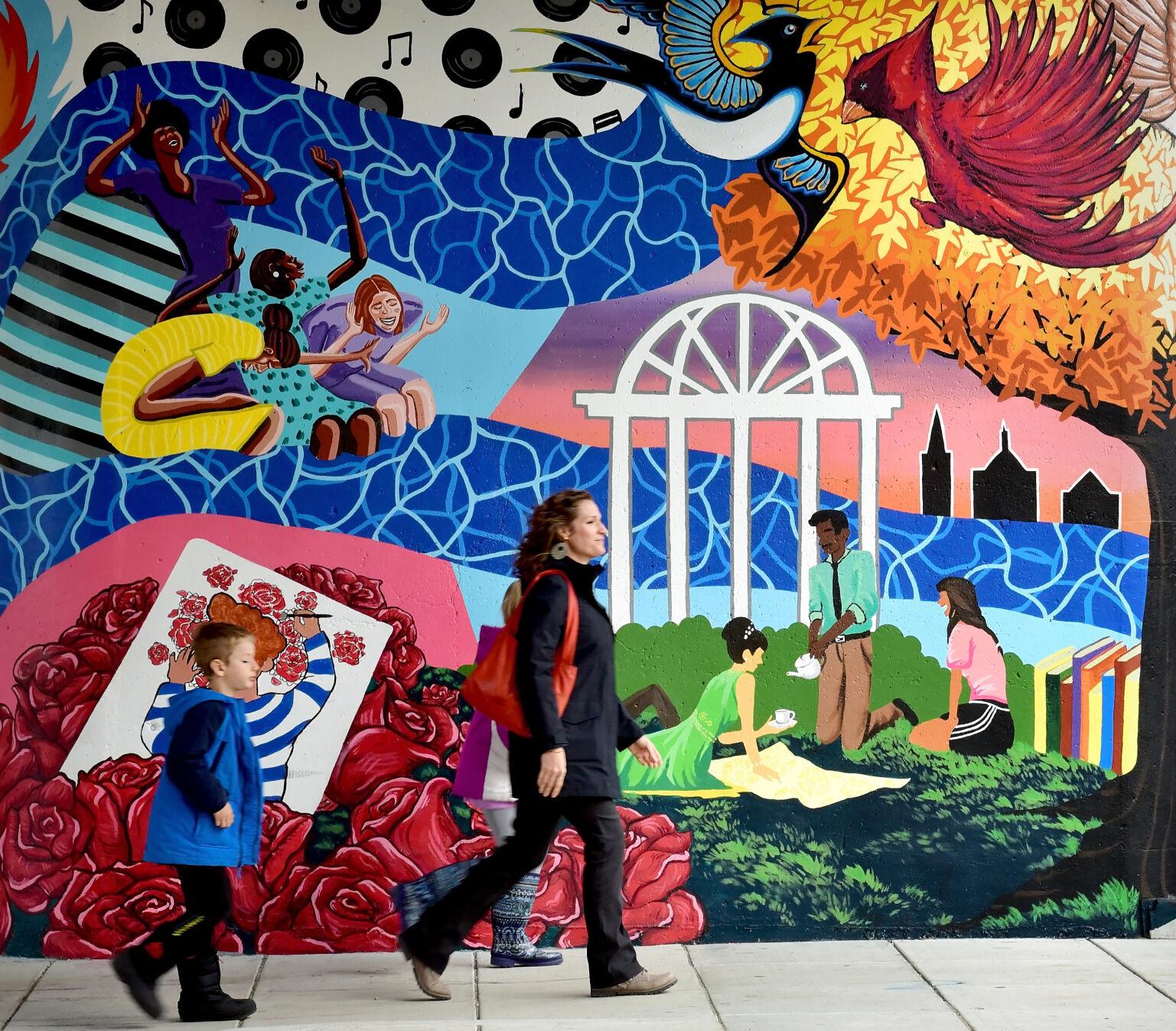 Strolling by mural under bridge at Promenade Park in Fort Wayne | Local ...