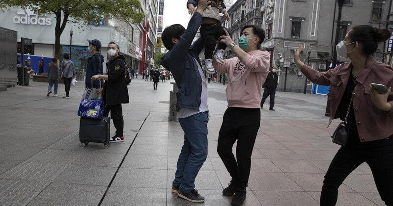 Wuhan, origin of virus, warily revives amid limits | News ...