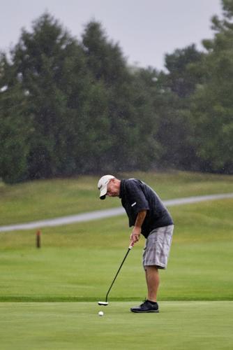 Despite getting pelted with rain, putters heat up at Senior City; Derek ...