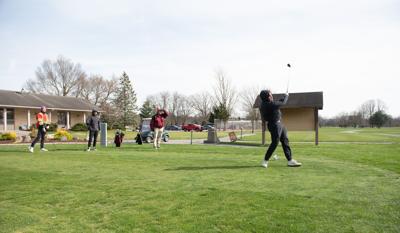 Windy golf practice | Local | journalgazette.net