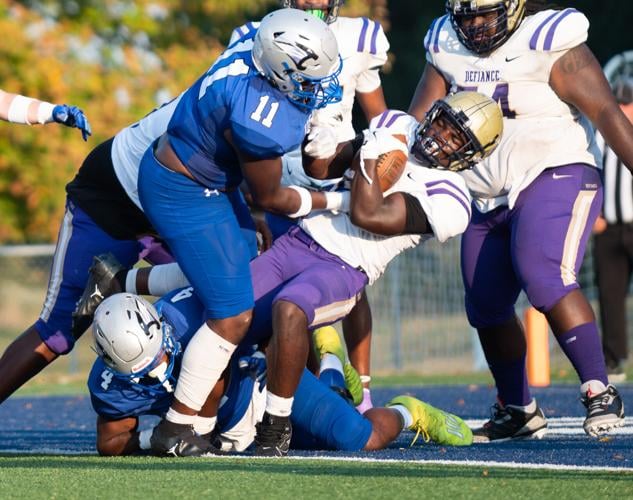 A.J. Moore, back from ACL tear, propels Cougars' defensive line play ...