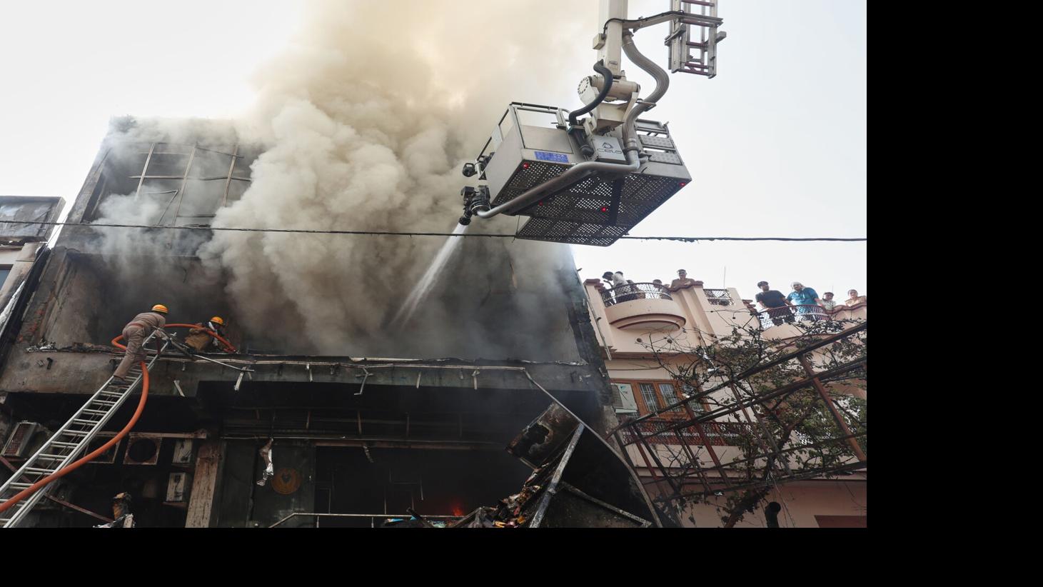 Fire tears through building in northern India, killing 14, mostly ...