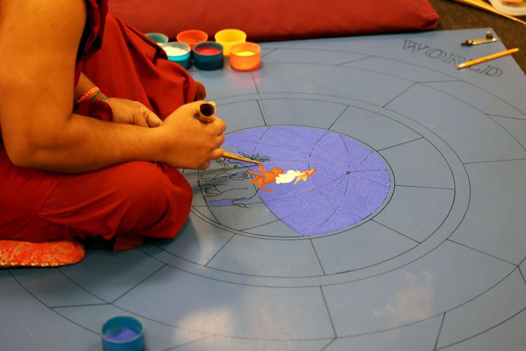 Monks start work on mandala at Allen County Public Library ...