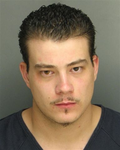 Underneath man’s suspicious jacket, police find sawed-off shotgun