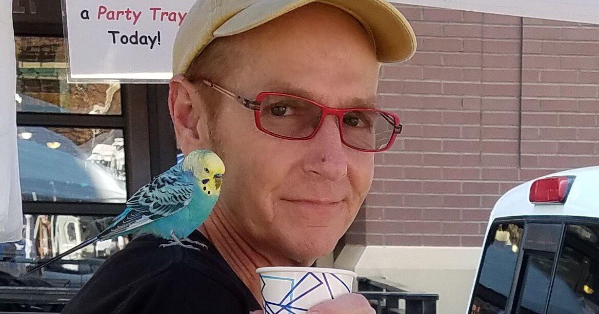 Family befriends lost parakeet: 'We're trying not to get too attached ...