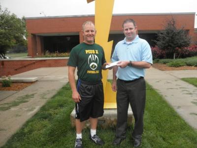 Pius X baseball program receives $500 grant