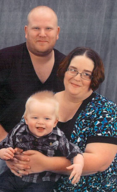 Crash victim's husband: SUV hit ice, went rolling