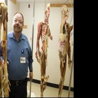 Lincoln nursing students learn anatomy from plasticized cadavers
