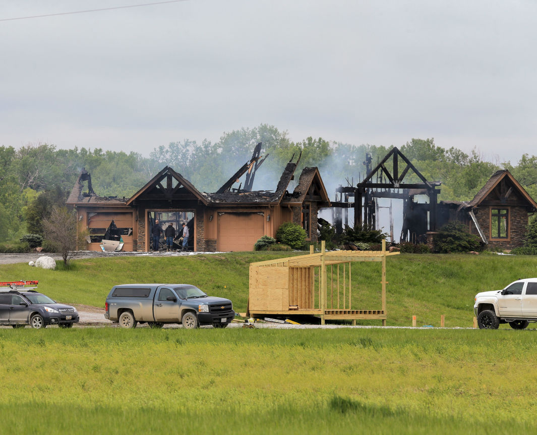 Fire razes home of former Husker football player