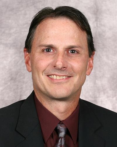 Chmelka named men’s gymnastics coach