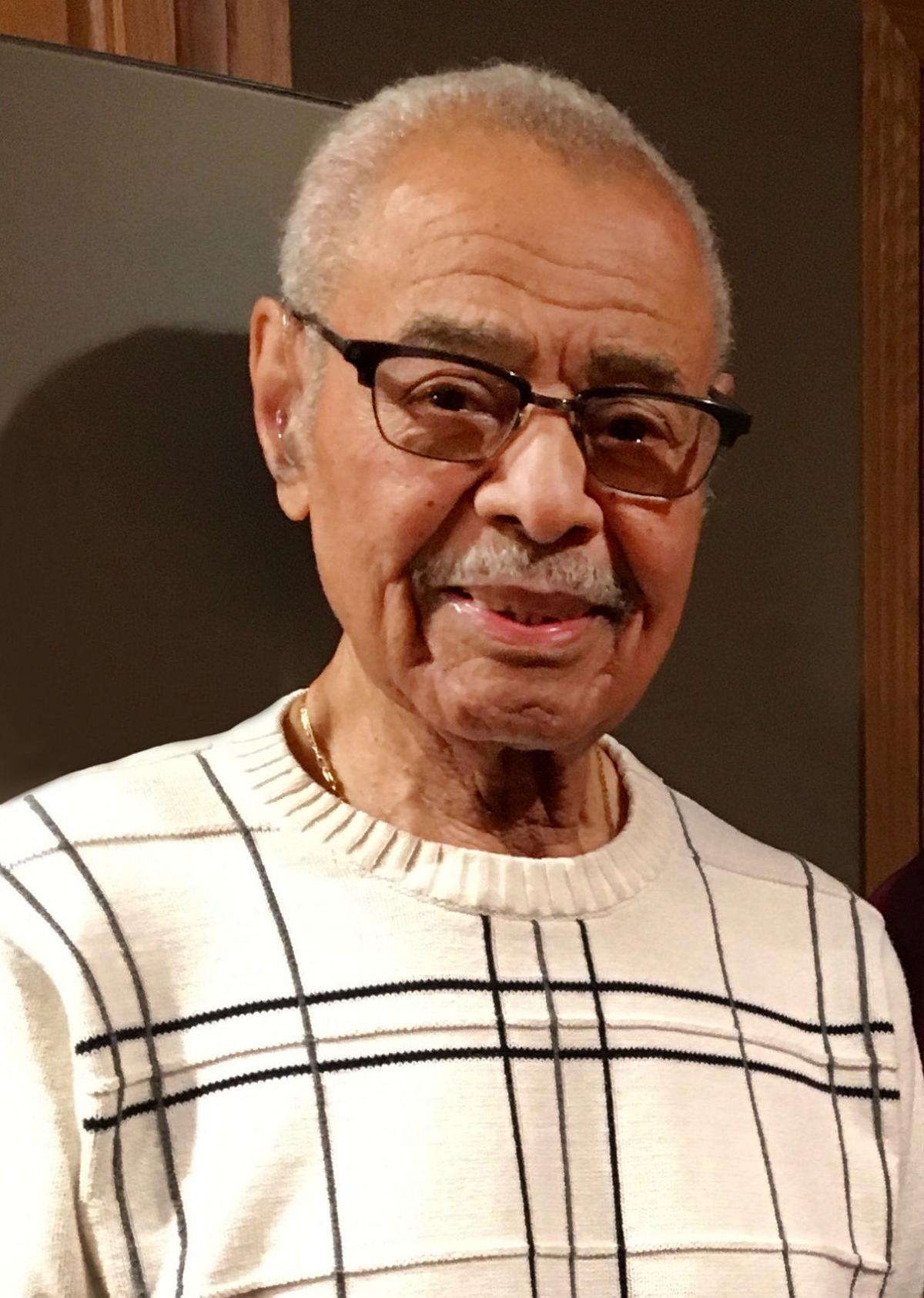Maurice Russell, a black man in a white coat and the master of his fate