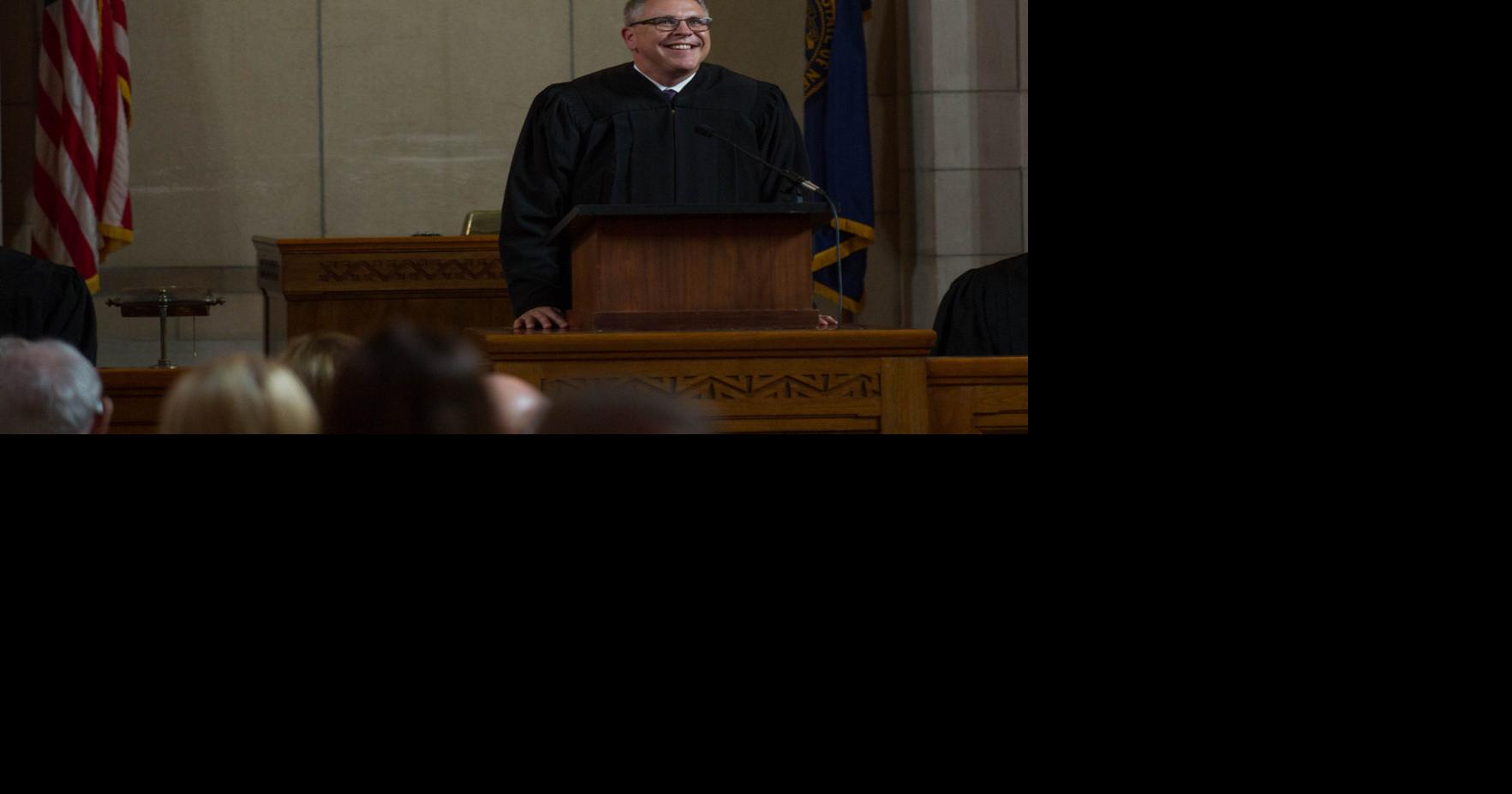 Newest Nebraska Supreme Court Justice Freudenberg enrobed by family
