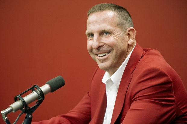 Pelini goes with red blazer