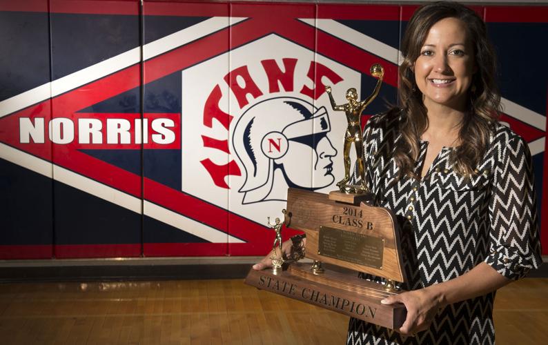 Girls Co-Coach of the Year: Boesiger at home coaching the Titans