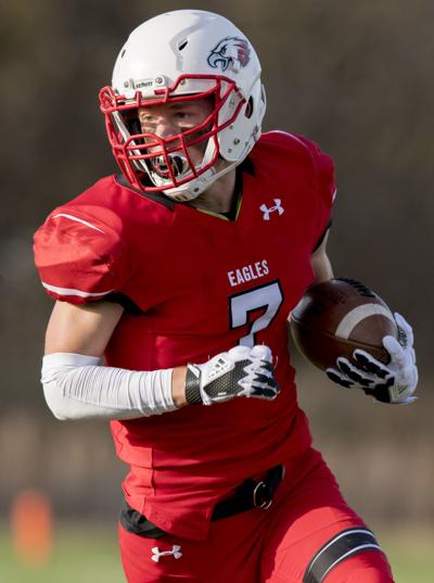 Photos: Johnson-Brock punches ticket to semifinals