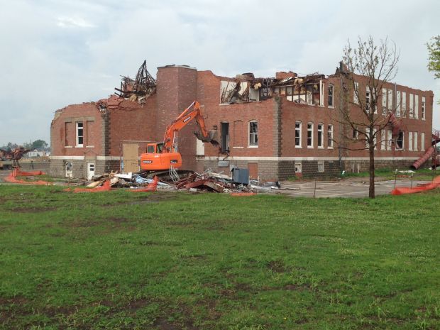 Photos: Crews tear down school