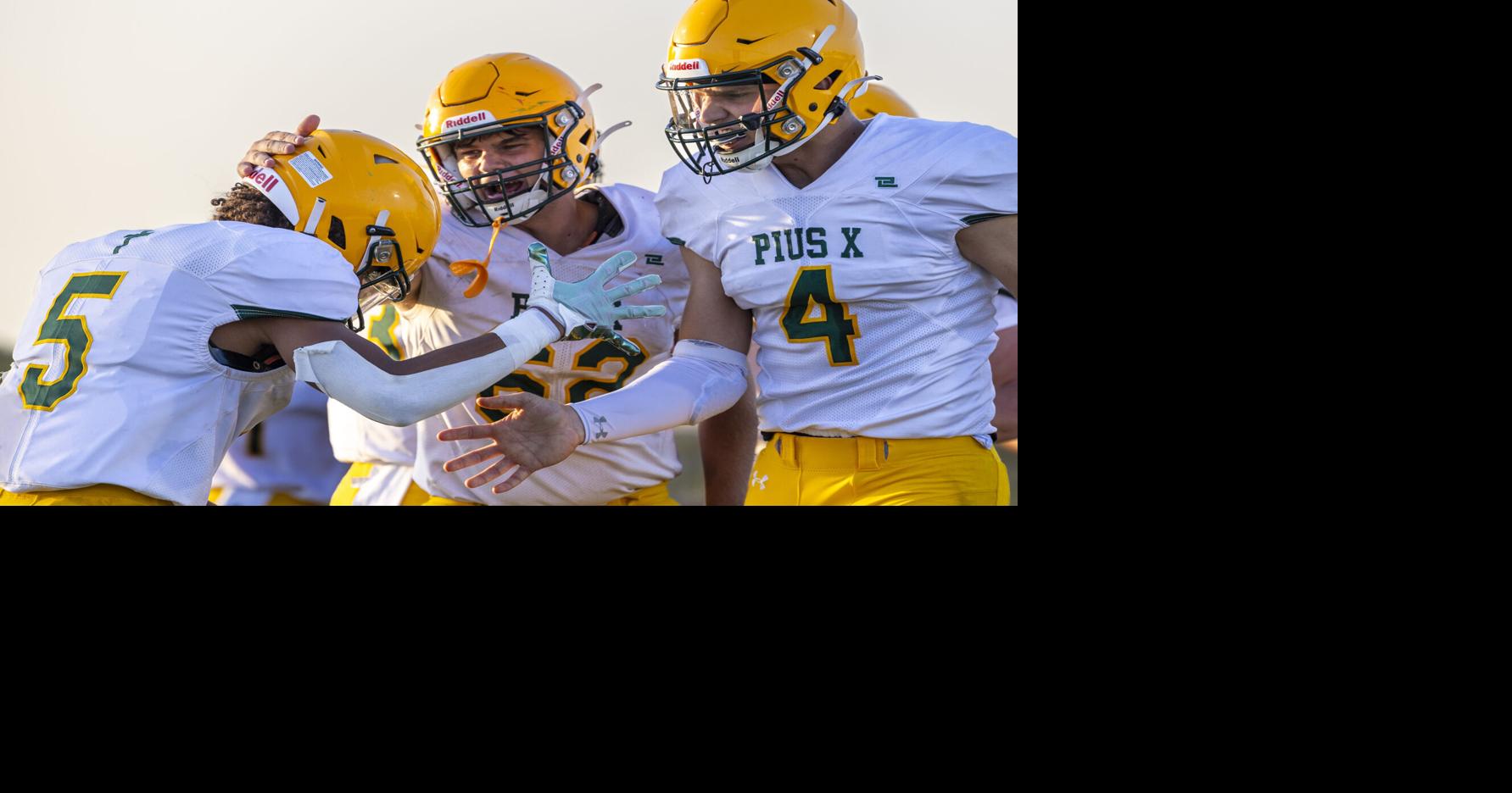 Photos: City battle between Northwest, Pius X opens high school ...