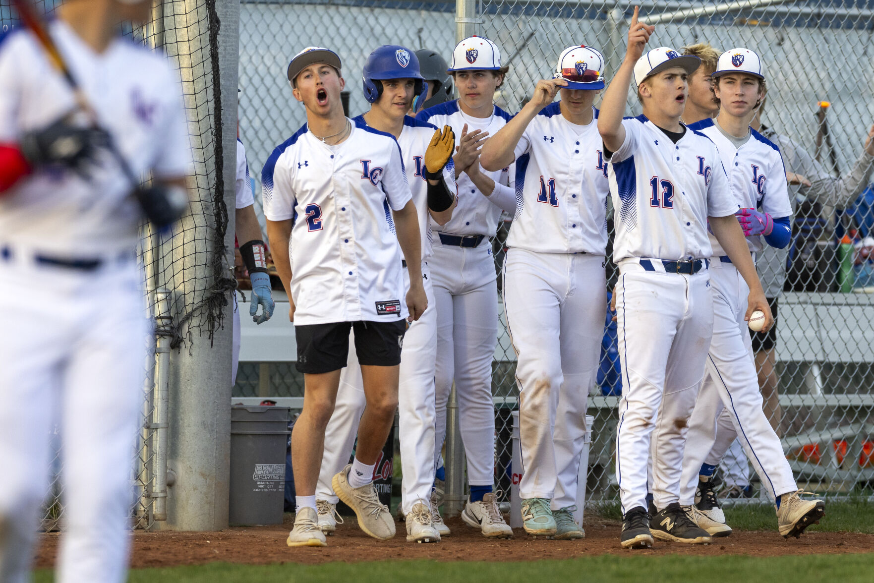 Malcolm takes advantage of strong winds, hits three home runs in win ...
