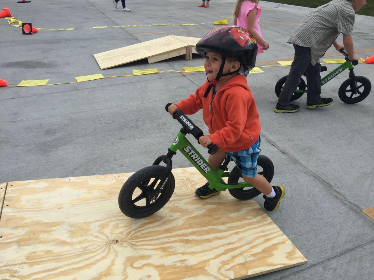 Raising Canes gives away 120 Strider Bikes to Lincoln toddlers