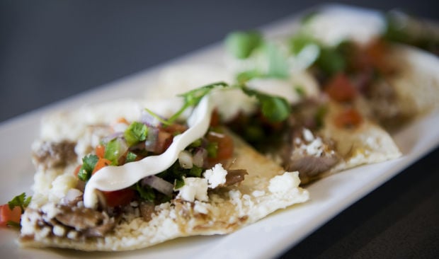 Review: Gate 25 combines bar atmosphere, un-barlike menu