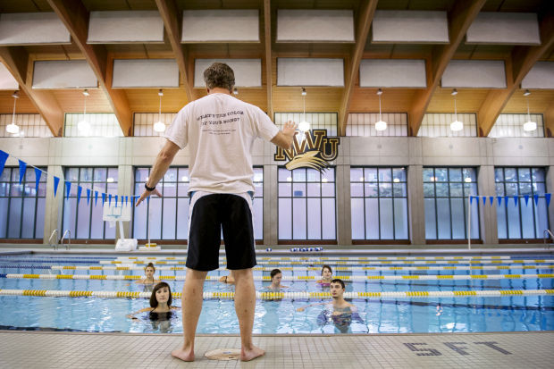 NWU students learning music conducting in the pool