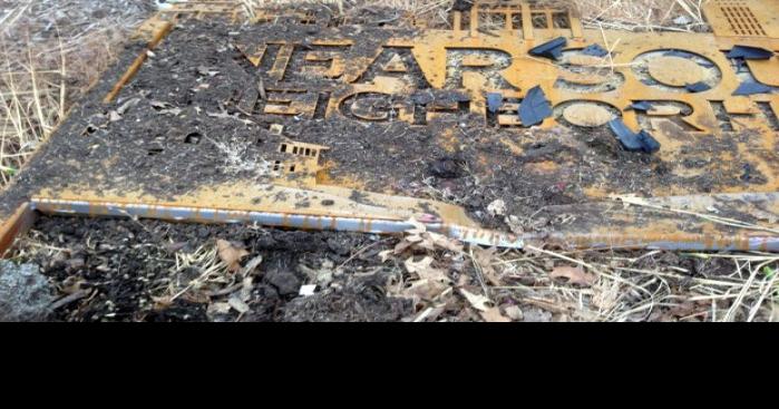 Sleuthing finds suspect who slammed into special sign