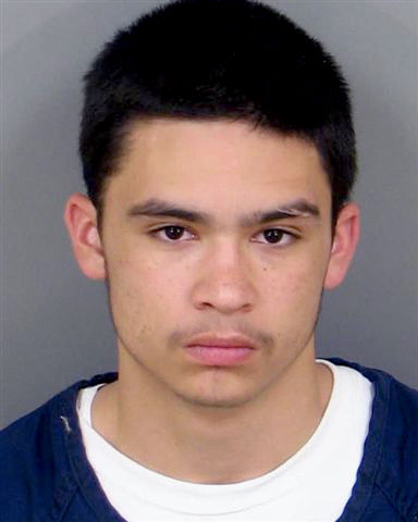 Son of elderly robbery victims confronts attacker at parole hearing