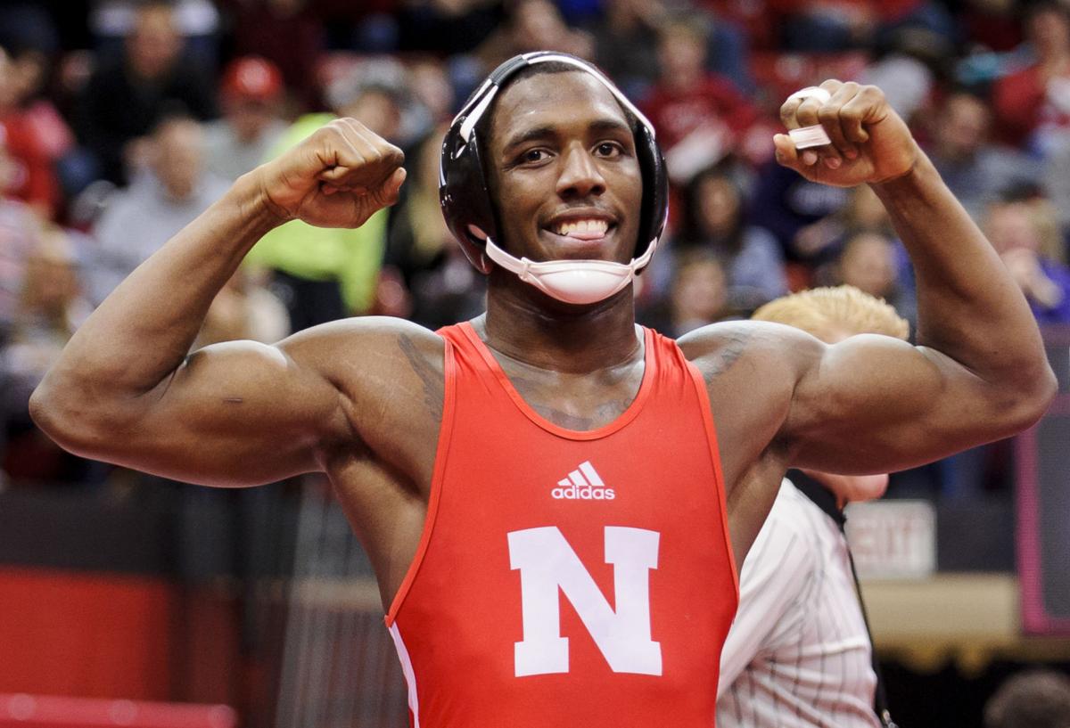 Dudley dominates as Huskers handle Wildcats on the mat
