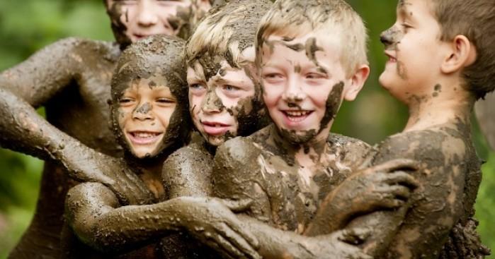 Mud celebration leaves kids rolling in joy